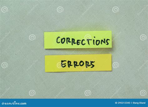 concept of corrections errors write on sticky notes isolated on wooden