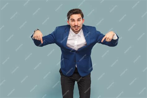 Premium Photo Angry Man Standing Pointing Down Giving Command Looking