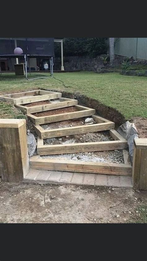 Modern Backyard Landscaping With Wooden Board Steps