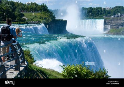 Tourists Taking Photo Of Niagara Falls High Resolution Stock