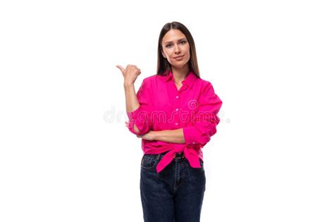 Portrait Of A Young Brunette Secretary Woman Wearing A Pink Shirt Tied