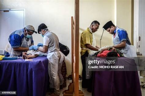 Mass Circumcision In Malaysia Photos and Premium High Res Pictures - Getty Images