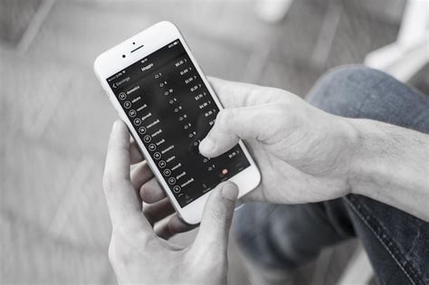 Cropped Image Of Hand Using Mobile Phone Premium Photo