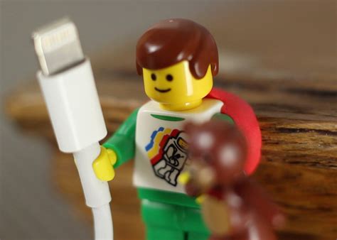 Lego Figurines Provide Makeshift Holders For Apple Firewire Cables