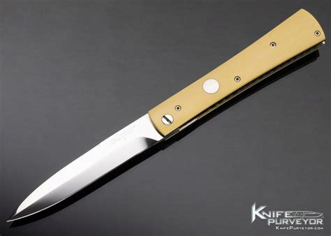 Rainy Vallotton Paper Micarta Double Action Button Release Automatic