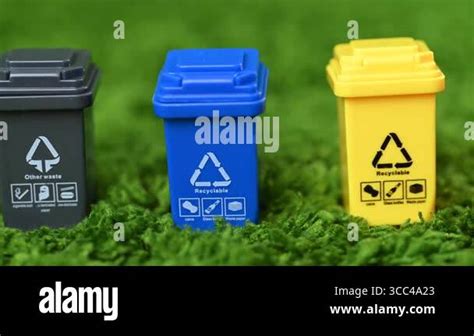 Trash Bins On Green Grass Stock Video Footage Alamy