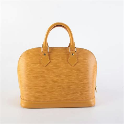 Louis Vuitton Alma Top Handle Bag In Tassil Yellow Epi Leather Everything But The House