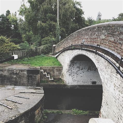 Premium Photo Bridge Over Canal