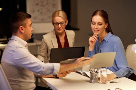 premium photo business deadline and technology concept coworkers with