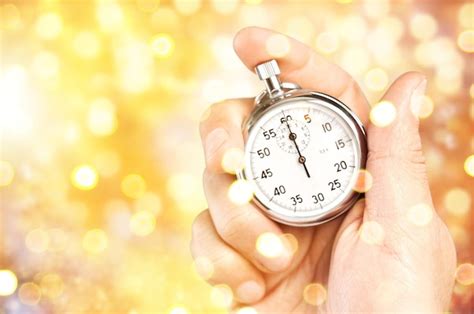 Premium Photo Close Up Stopwatch In Human Hand Timer