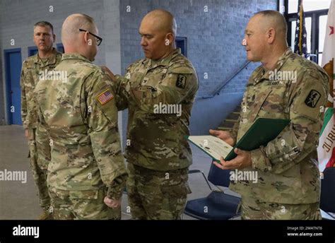 Us Army Capt Daniel Borkert Outgoing Commander Of Headquarters And Headquarters Company