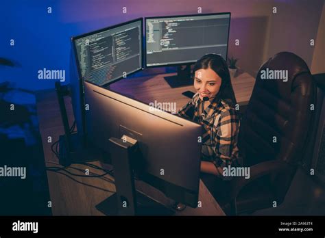 Photo Of Hard Working Software Developer In Headset Smiling Toothily Looking Into Screen Using