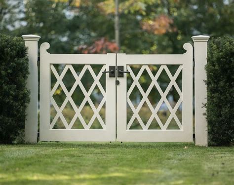 White Garden Gate In Green Grass
