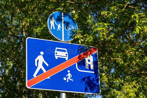 Complex Urban Traffic Signs Displaying Multiple Icons For Pedestrian