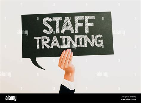 Text Showing Inspiration Staff Traininga Program That Helps Employees