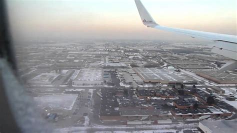 Landing to snow covered Chicago O'hare Airport - YouTube