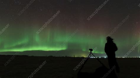 Photographer Observing Northern Lights Iceland Stock Image F042