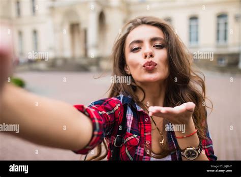 Young Girl Take Selfie From Hands With Phone On Summer City Street