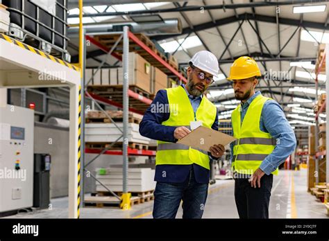 Supervisor Manager Scolding Employee In Modern Industry Factory
