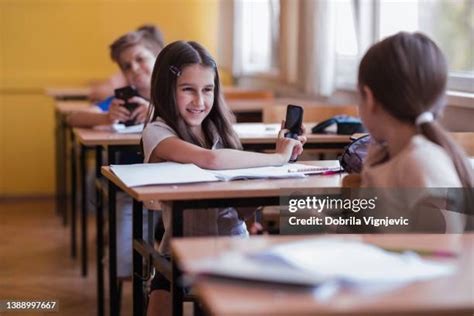 smartphone in classroom photos and premium high res pictures getty images
