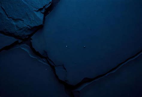 A Blue Surface With Small White Objects Floating On It Premium Ai Generated Image