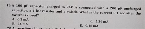 Solved 19 A 100 Uf Capacitor Charged To 24v Is Connected