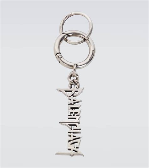 balenciaga typo logo keychain in metallic for men lyst