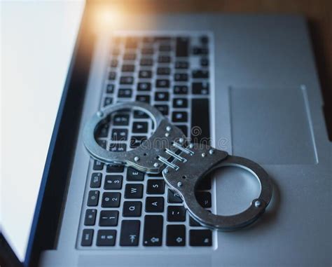 is your data in safe hands an unrecognisable hacker using a laptop in