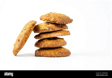 Stack Of Home Made Irregular Shaped Cocnut And Chocolate Chip Cookies