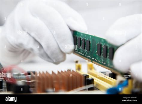 Expert Engineers Examining Computer Equipment Stock Photo Alamy