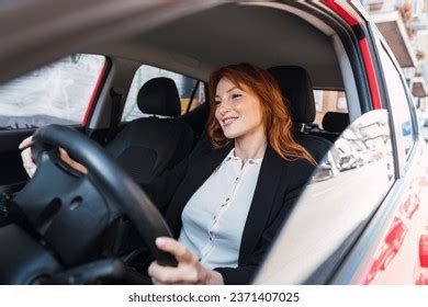 Happy Redhead Businesswoman Driving Car Stock Photo Shutterstock