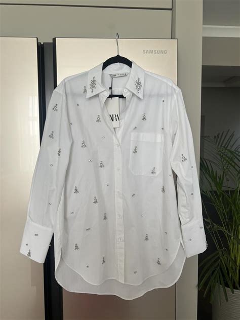 Шикарна нова біла сорочка оверсайз в стразах Zara розмір м — ціна 2200 грн у каталозі Сорочки