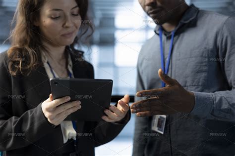 Team Of Technicians In Data Center Automating Routine Maintenance Tasks