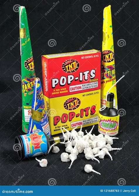 Low Grade Hand Held Fireworks Like Pop Its And Party Poppers On A Black