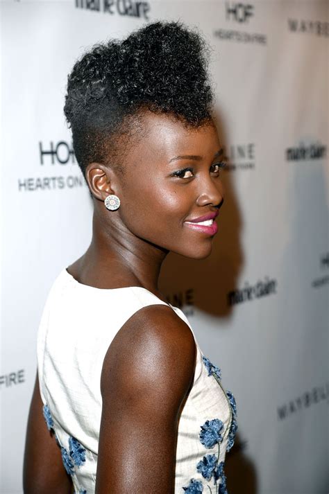 Lupita Nyongo Styles Her Hair Into A Curly Pompadour Glamour