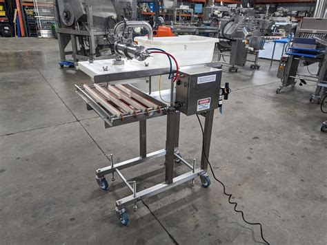 quantum conveyorized target sauce applicator