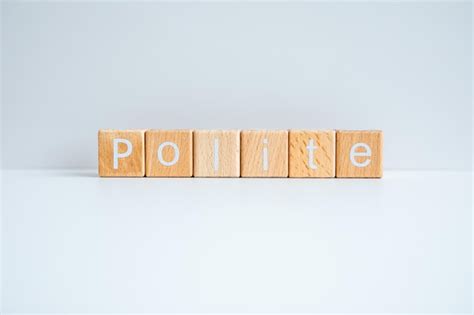 Premium Photo Wooden Blocks Form The Text Polite Against A White