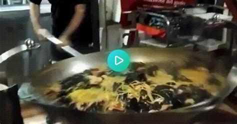 chef handling an enormous frying pan on imgur