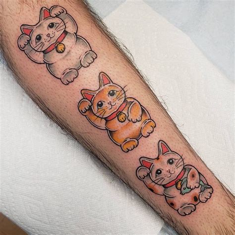 Maneki Neko Tattoos Origins Meanings And Tattoo Ideas Lucky Cat Tattoo Maneki Neko Cat Tattoo