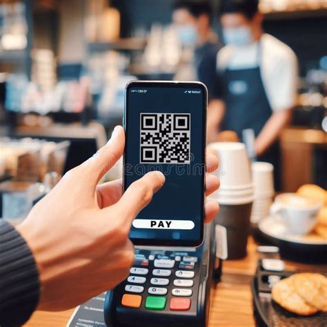 hands and phone close up scanning qr code on mobile phone paying in