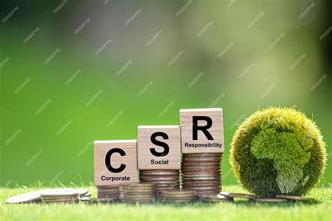Premium Photo Csr Coporate Social Responsibility Words Csr On A Woodblock And Green World On A