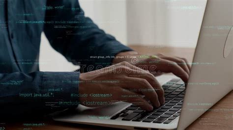Computer Programmer Uses Capable Laptop Computer To Develop Programming