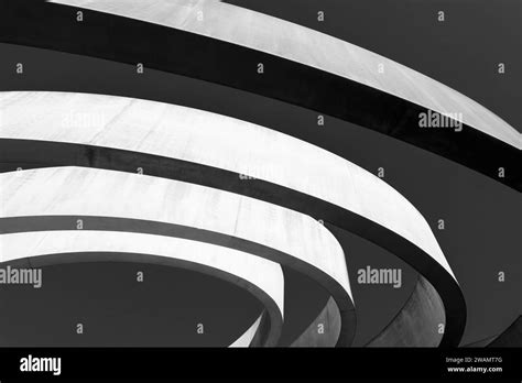 Striking Monochrome Architectural Feature With Sweeping Curves And A Dynamic Interplay Of Light