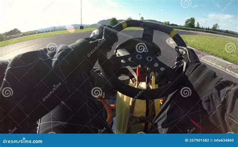 Pov Having Fun Racing A Go Kart Along A Bumpy Asphalt Racetrack On A