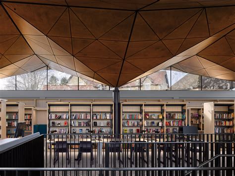 Woods Bagot Tops School Library With Tree Like Timber Ceiling