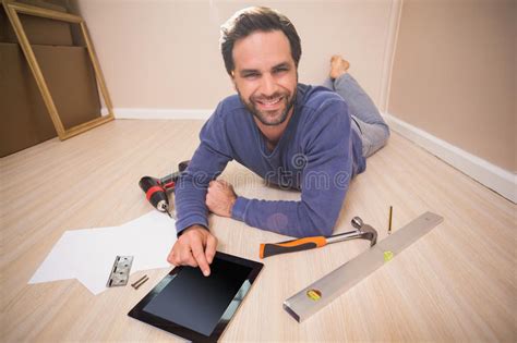 Man Lying Floor Tools Stock Photos Free Royalty Free Stock Photos From Dreamstime