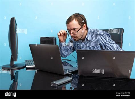 Portrait Of Concentrated Man Programmer Computer System Analyst