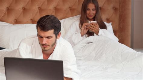 Handsome Man Working On His Laptop At The Hotel Room Stock Video At Vecteezy