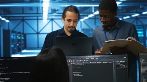 Premium Photo Man Inspects Server Hub Infrastructure Reading