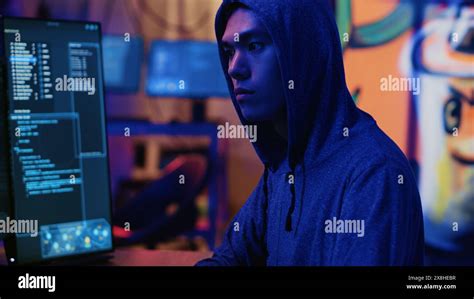 Asian Hacker In Dark Hidden Shelter Trying To Launch Ddos Attack On